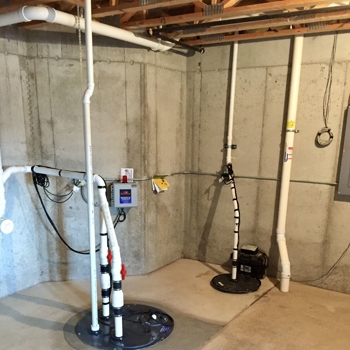 Sump Pumps & Crocks Photos | Rozga Plumbing Corporation